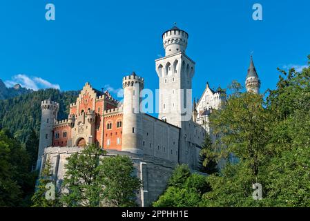Front view of the facade of Neuschwanstein Castle with entrance area ...