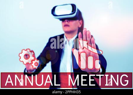Hand writing sign Annual Meeting. Word Written on Yearly gathering of ...