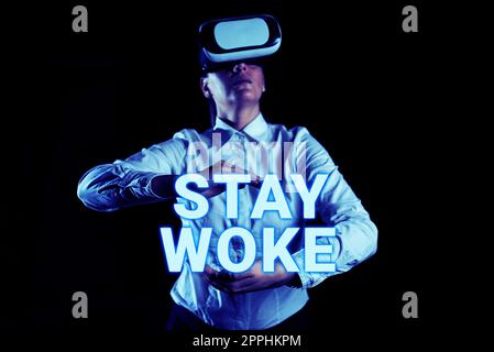 Conceptual caption Stay Woke. Internet Concept being aware of your ...