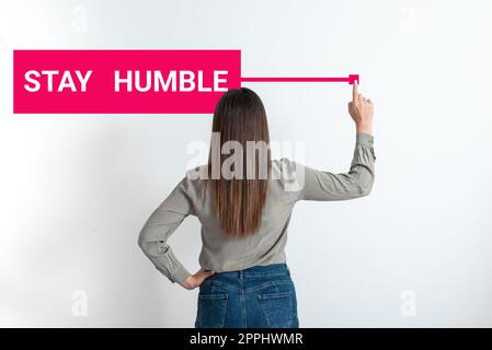 Hand writing sign Stay Humble. Word Written on not proud or arrogant ...