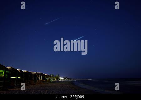 Beautiful view of shooting stars in night sky Stock Photo - Alamy
