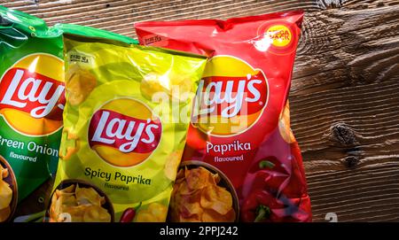 Composition with packets of Lays potato chips Stock Photo - Alamy