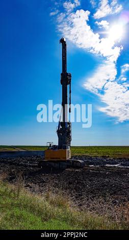 Yellow piling and drilling rig Liebherr LRB 125 on construction site ...
