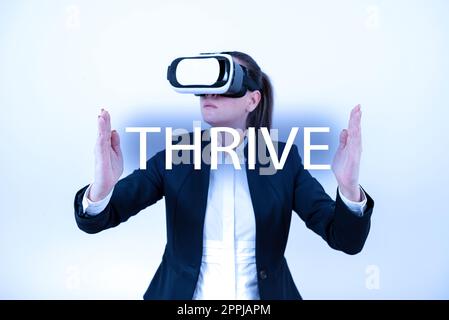 Hand writing sign Thrive, Business overview Think positively Continue ...