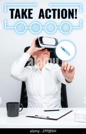 Hand writing sign Take Action. Business concept do something official ...