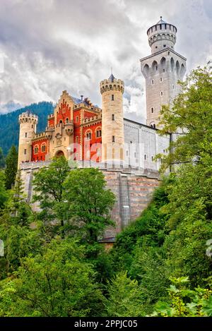 Front view of the façade of Neuschwanstein Castle with entrance area ...