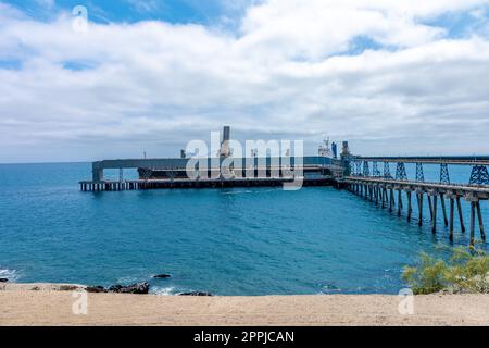 pipeline and port for loading of transport ships Stock Photo - Alamy
