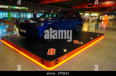 Dortmund, Germany - December 28, 2021: Sixt car rental employee waits ...