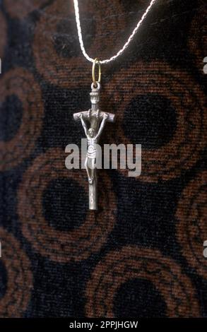 Pendant with Jesus christ crucified. Crucifix Stock Photo - Alamy