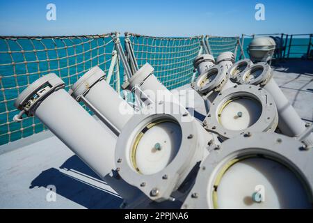 Chaff launcher is seen on the deck of a military ship sailing on the ...