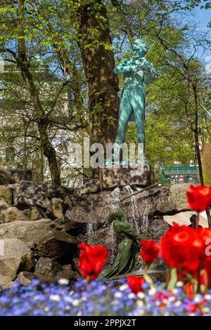 Norway - Bergen, Ole Bulls Plass. The statue of the poet lying Stock ...