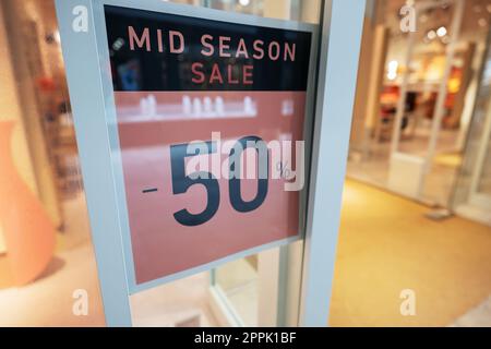 shop window poster advertising 50% off at a branch of the nationwide ...