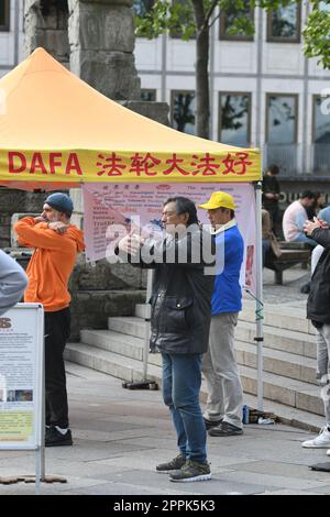 A vertical shot of people demonstrating in Cologne against organ ...