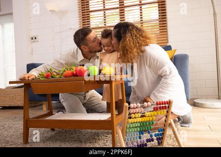 Parents teach children how to walk, hold objects, take turns, play ...