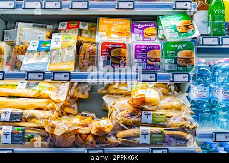 Pre-packaged foods displayed in a commercial refrigerator Stock Photo ...