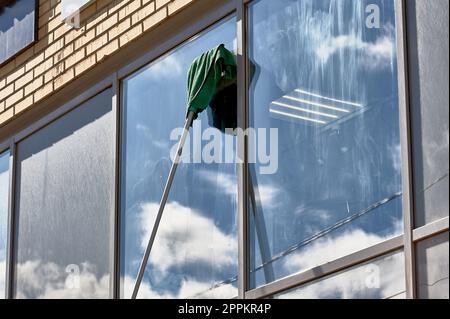 window washing, washing a street shop window Stock Photo - Alamy