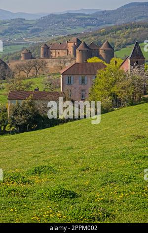 French village of Berzé-le-Châtel, in Burgundy and its medieval castle ...