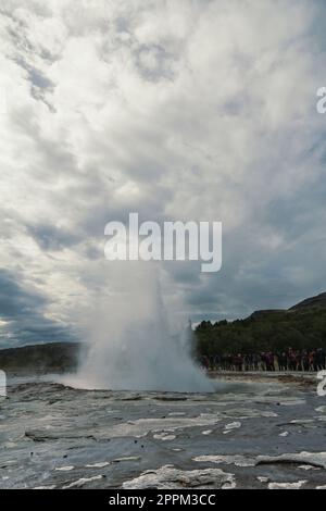 Eruption of Strokkur geyser landscape photo Stock Photo - Alamy