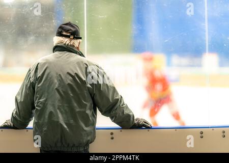 a spectator at a game in a hockey stadium Stock Photo - Alamy