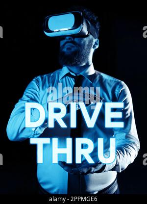 Hand writing sign Drive Thru, Business approach place where you can get ...