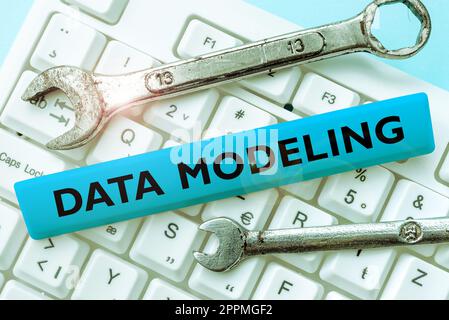 Writing displaying text Data Modeling. Concept meaning process of transferring data between data ...