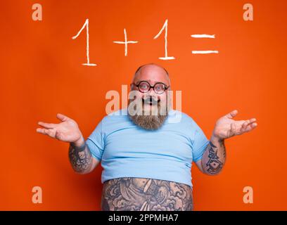 Confused fat thoughtful man acts like a nerd person Stock Photo - Alamy