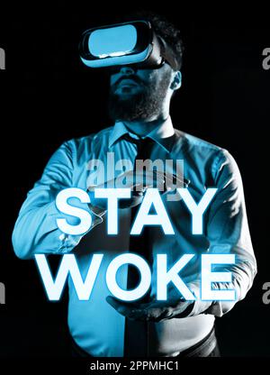 Text sign showing Stay Woke, Concept meaning being aware of your ...