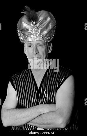 An elder sultan or shiek isolated over black Stock Photo - Alamy