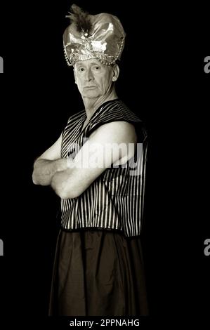 An elder sultan or shiek isolated over black Stock Photo - Alamy