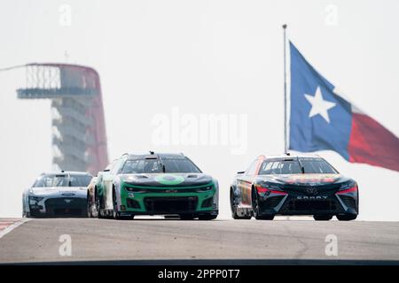 Austin Dillon races for position for the Echo Park Automotive Grand ...