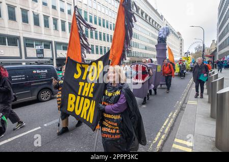 London, UK. 24 Apr 2024. A procession from the Department for Energy ...