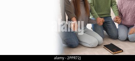 Group of Christians praying together. Banner for design Stock Photo - Alamy