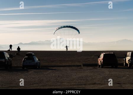 Draper, UT, US-February 12, 2022: Paraglider flying above Point of ...