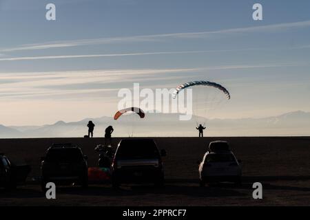 Draper, UT, US-February 12, 2022: Paraglider flying above Point of ...