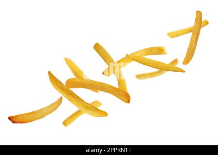 Tasty french fries falling on white background Stock Photo - Alamy
