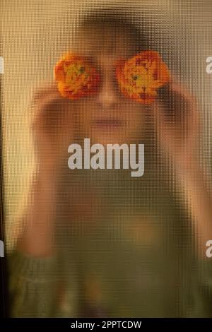 Women's portrait through a matte glass Stock Photo - Alamy