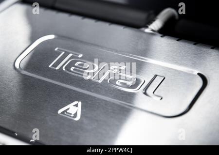 Tefal logo on electric grill. Stainless steel, special non-stick ...