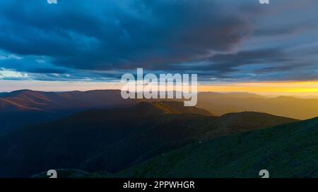 The beautiful Mount Feathertop during vibrant orange sunset in Australia Stock Photo - Alamy