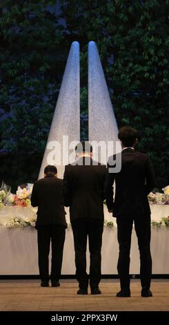 People pray for victims at a memorial facility at the accident site in Amagasaki City, Hyogo ...