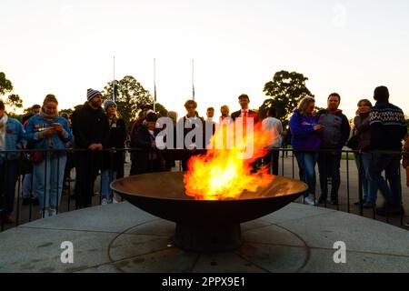 Members of the public stand at the eternal flame while paying their ...
