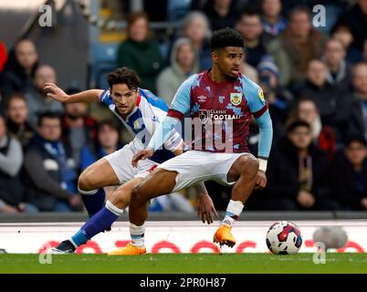 Blackburn Rovers' Lewis Travis (left) and Millwall's Mihailo Ivanovic ...