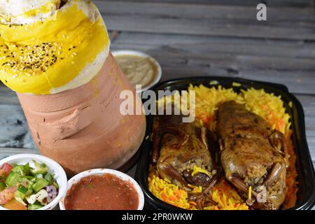 Background of Egyptian Hamam pigeons Mahshi stuffed squab with rice and ...