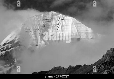 The mist enshrouded North Face of MOUNT KAILASH (6638 M) is a sacred ...