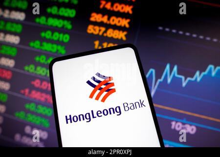 In this photo illustration, the Hong Leong Bank Berhad logo is displayed on a smartphone screen ...