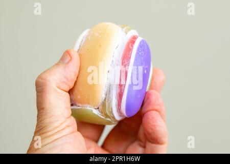 Ball of Used Soaps of different colors. economy and use Stock Photo - Alamy