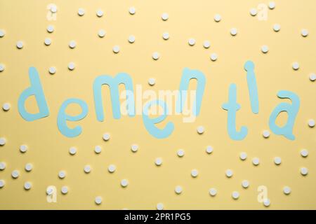 Word Dementia made of paper letters on beige background, flat lay Stock ...