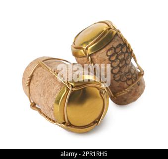 Sparkling wine corks with muselet caps on white background Stock Photo ...