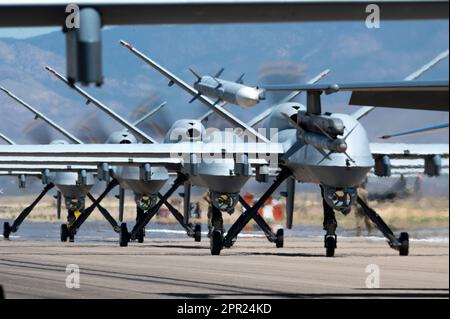 Forty-nine F-16 Vipers and MQ-9 Reapers assigned to the 49th Wing line ...