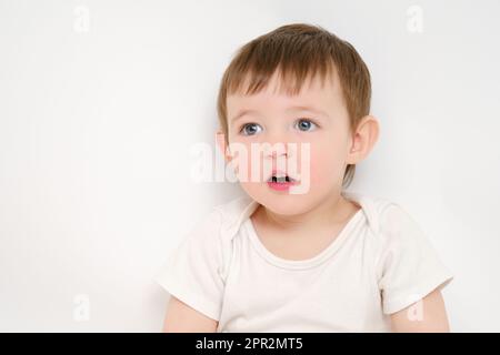 Photo portrait small boy amazed showing fingers copyspace isolated ...