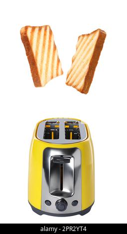 Roasted bread popping up of toaster on white background Stock Photo - Alamy